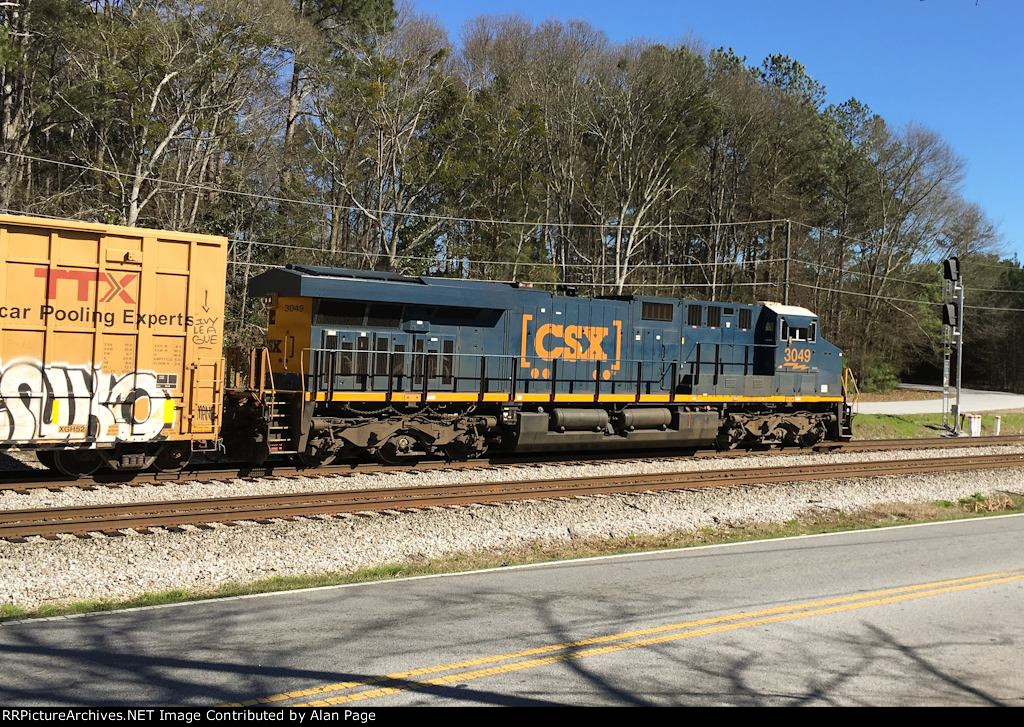 CSX 3049 gives a well-needed push at the tail end